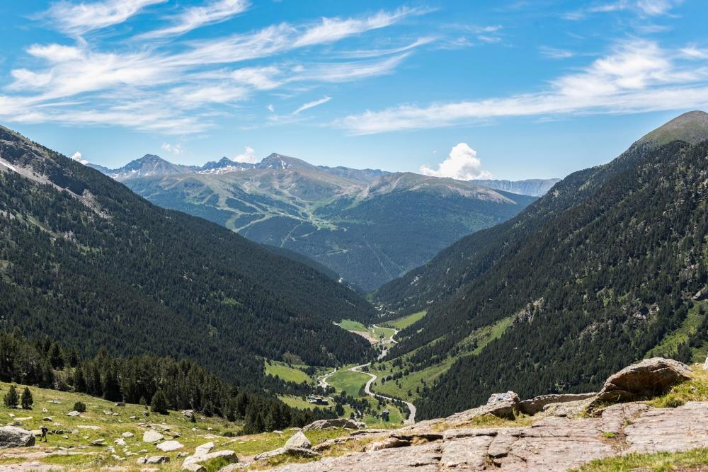 Panoramic view of Andorra's mountains and valley from a mountain path ...